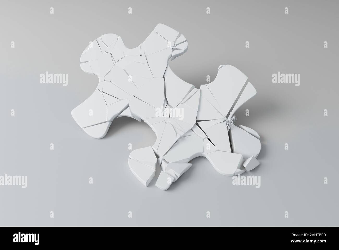Puzzle piece breaking in pieces Stock Photo - Alamy