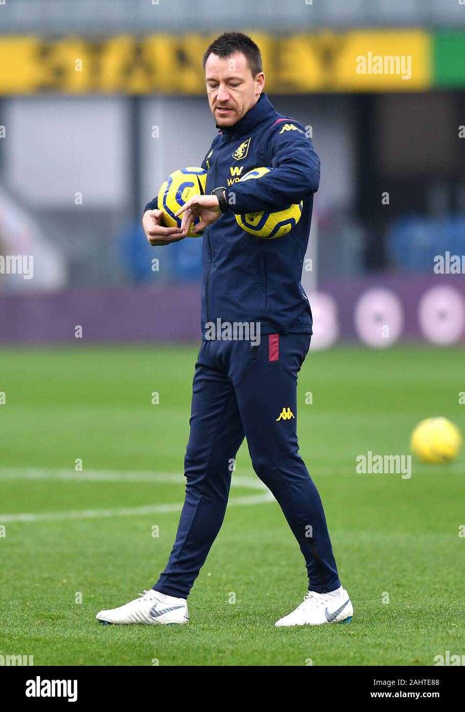 Aston Villa first team coach John Terry watches the warm up before the ...