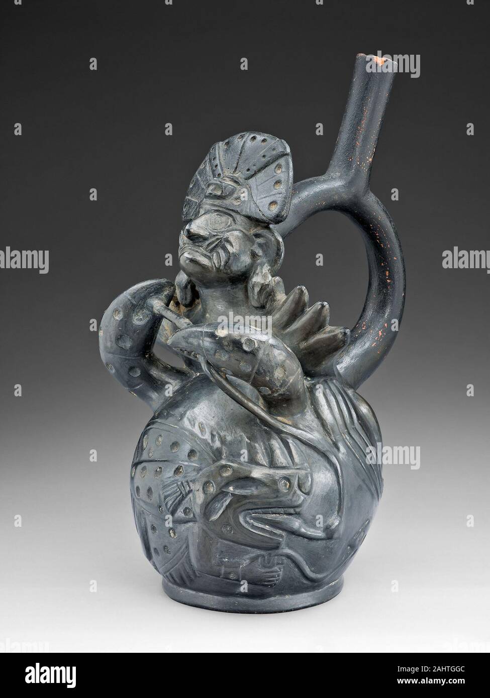 Moche. Blackware Vessel in the Form of a Figure Fishing, Possibly Ai ...