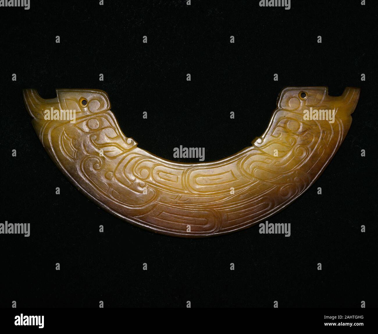 Arc-shaped pendant (huang). 1000 BC–800 BC. China. Jade Stock Photo - Alamy