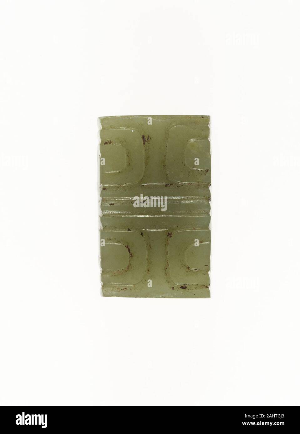 Bead with Spirals. 1000 BC–700 BC. China. Jade Stock Photo - Alamy