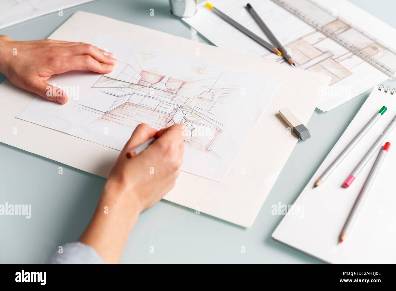 Interior designer drawing pencil sketch of a kitchen. Interior design ...