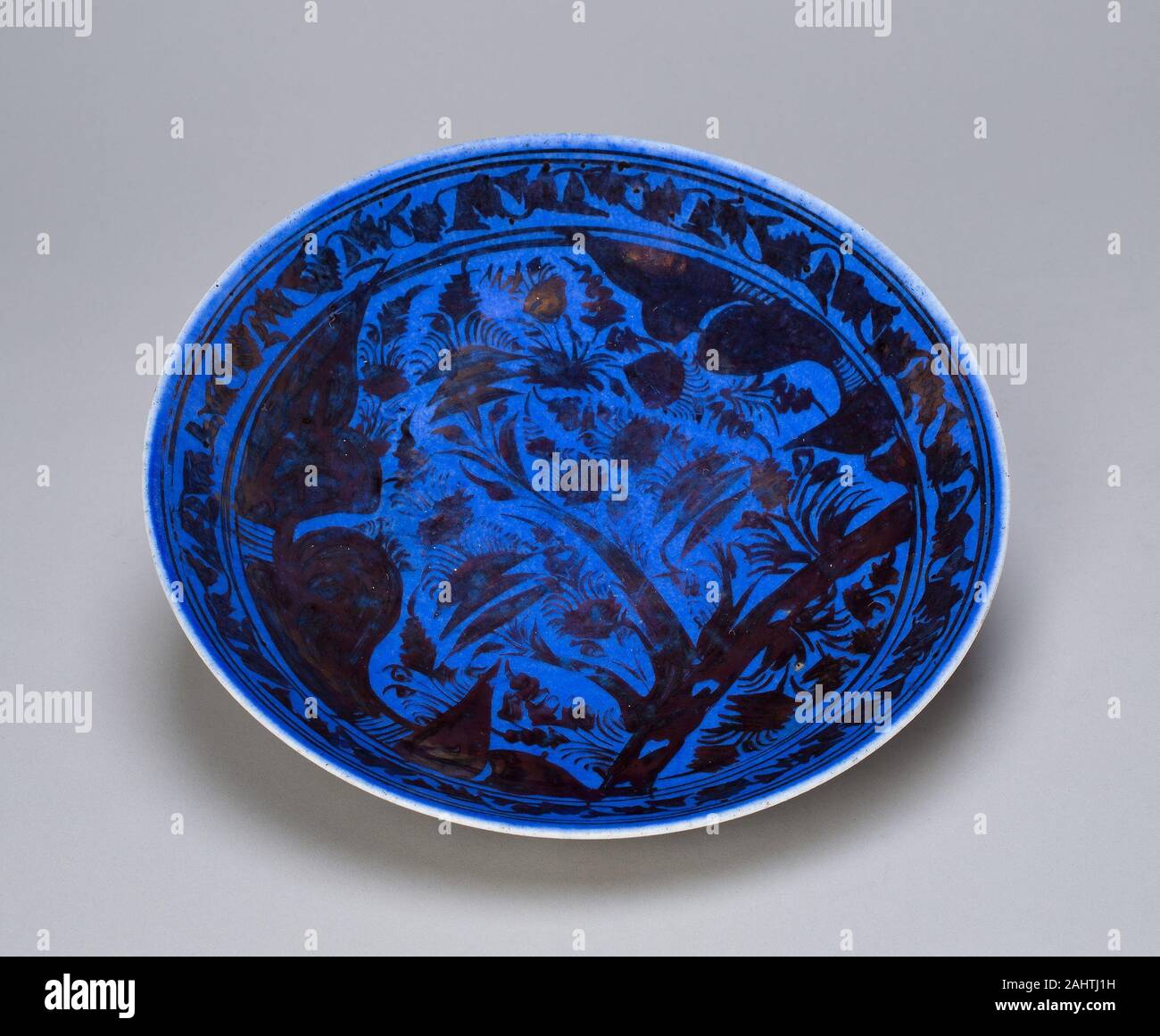 Islamic. Dish with landscape scene. 1601–1650. Isfahan. Fritware, slip ...