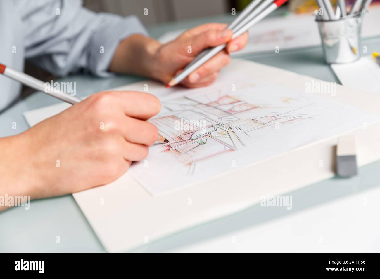 Interior designer drawing pencil sketch of a kitchen. Interior design ...