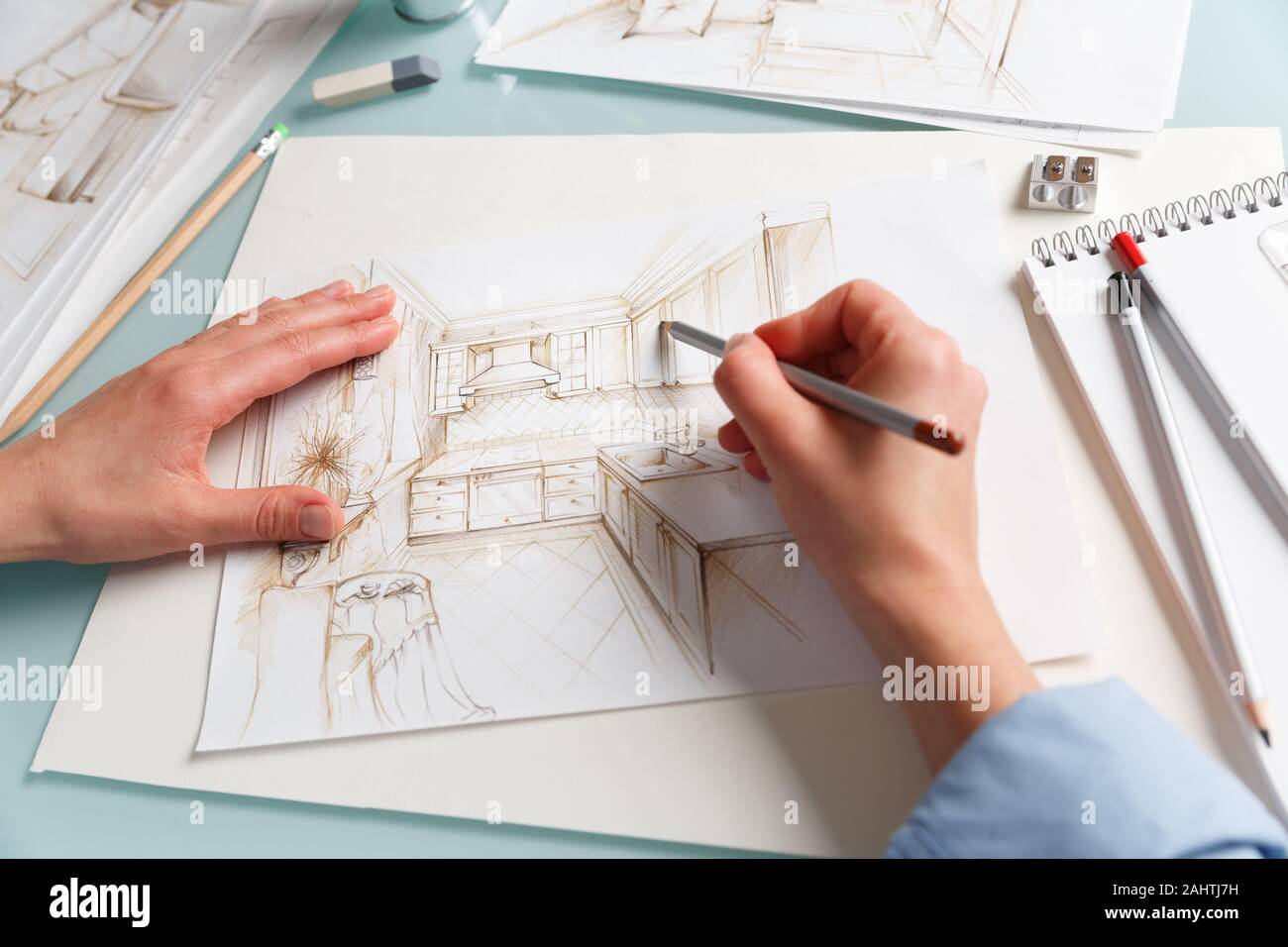 Interior designer drawing pencil sketch of a kitchen. Interior design ...