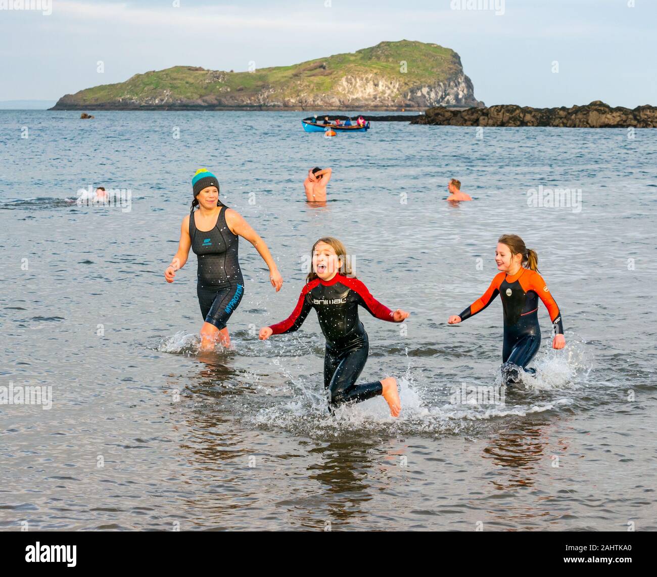 Woman wetsuit scotland hi-res stock photography and images - Alamy