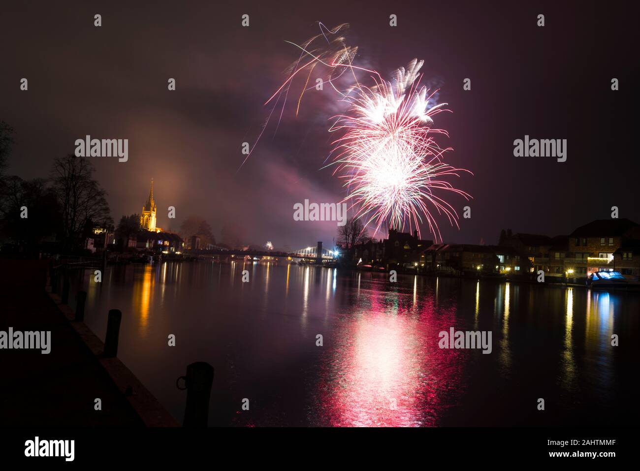 The annual New Year Fireworks display at Marlow on the river Thames in ...