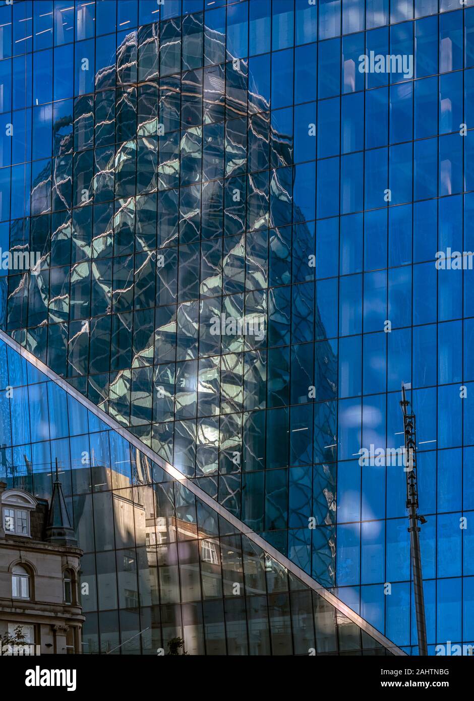 LONDON, UK - SEPTEMBER 27, 2018: Reflection of the Gherkin building in ...