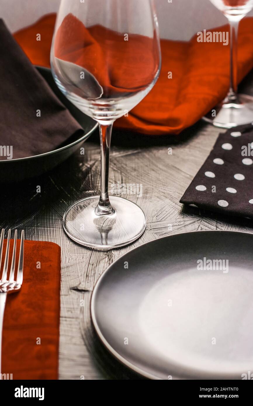 Dishware, menu and table concept - Empty tableware with brown napkin ...