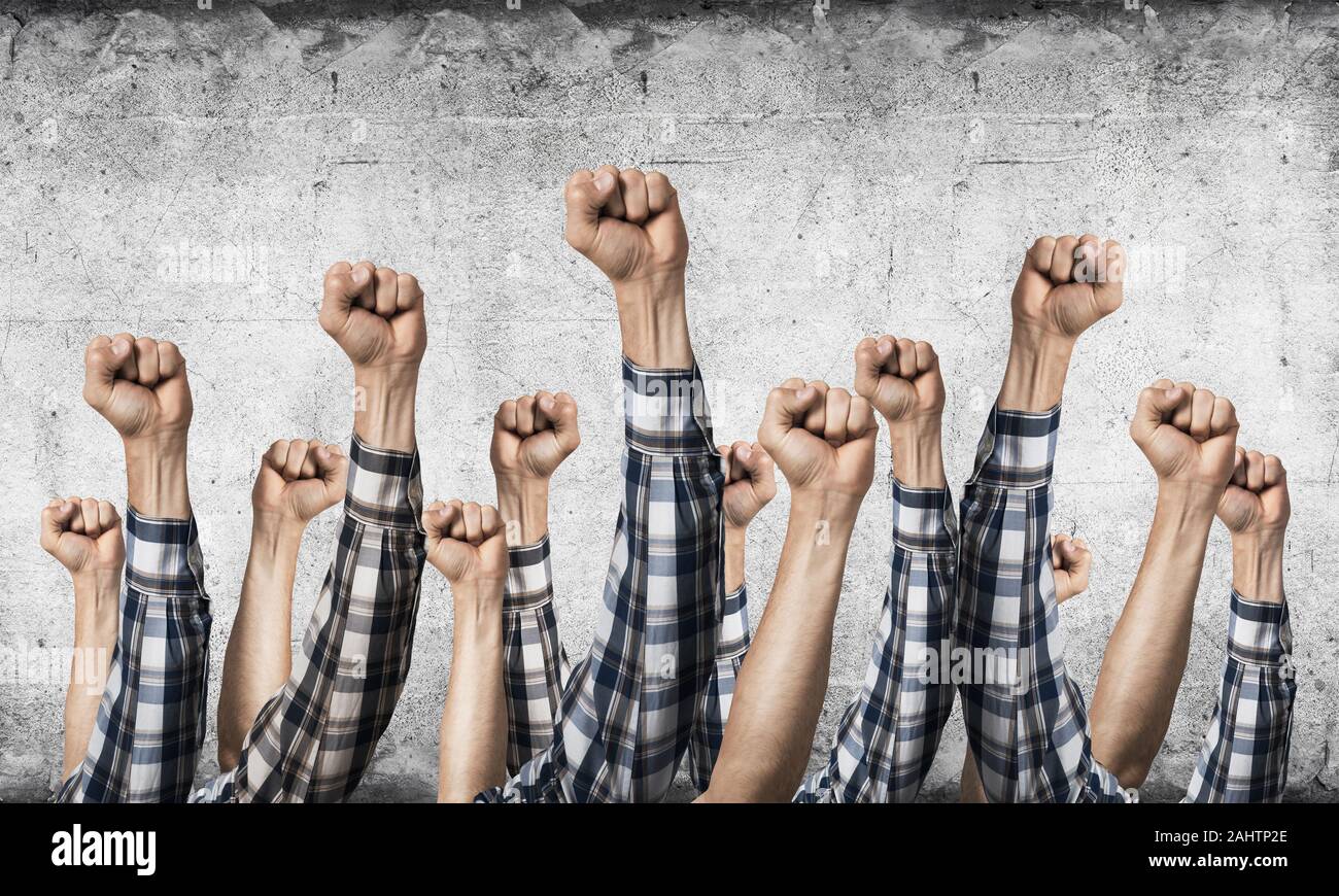 Row of man hands showing clenched fist gesture. Victory or protest ...