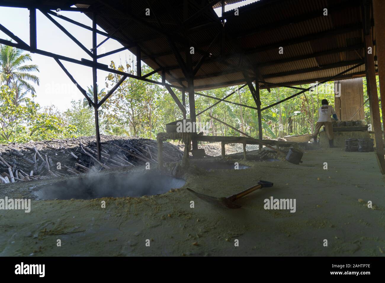 Boiling liquid sulphur releases poisonous gas in a processing factory ...