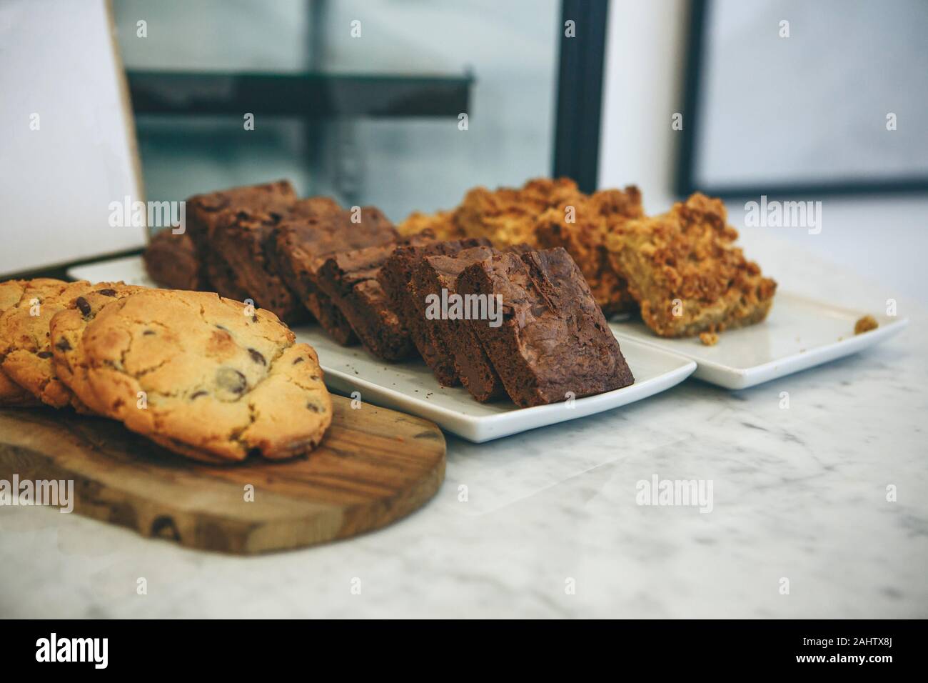 Closeup of fresh baked cookies in a cafe or shop Stock Photo - Alamy
