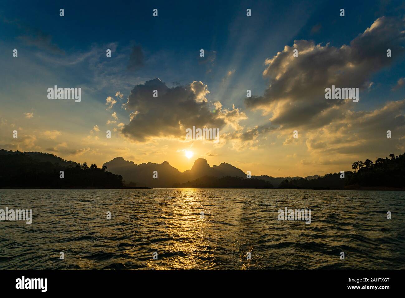 Sunset at Ratchaprapa dam, or known as Cheow Lan dam Stock Photo - Alamy