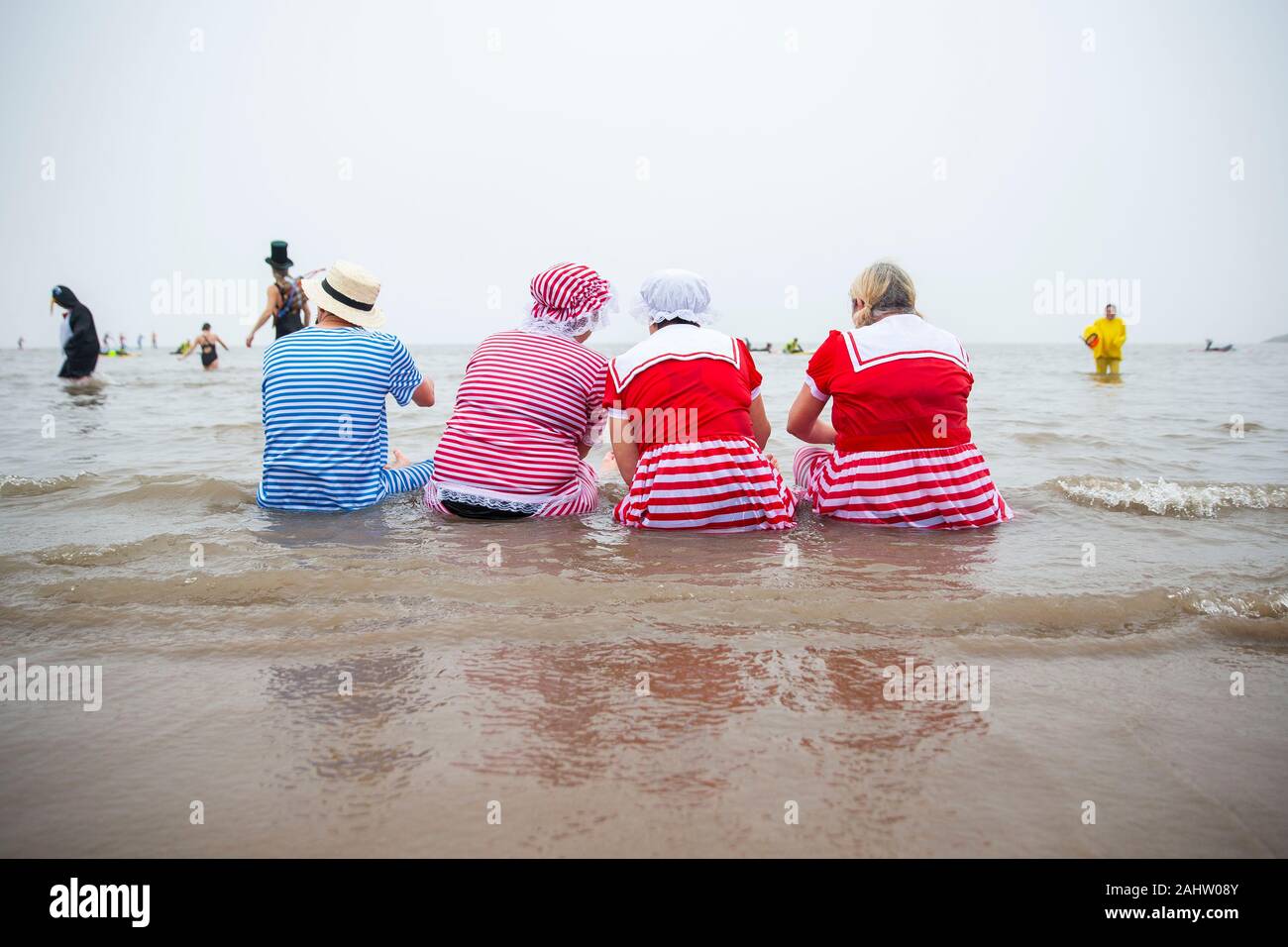Barry, Wales, UK, January 1st 2020. Revellers in old fashioned dress ...