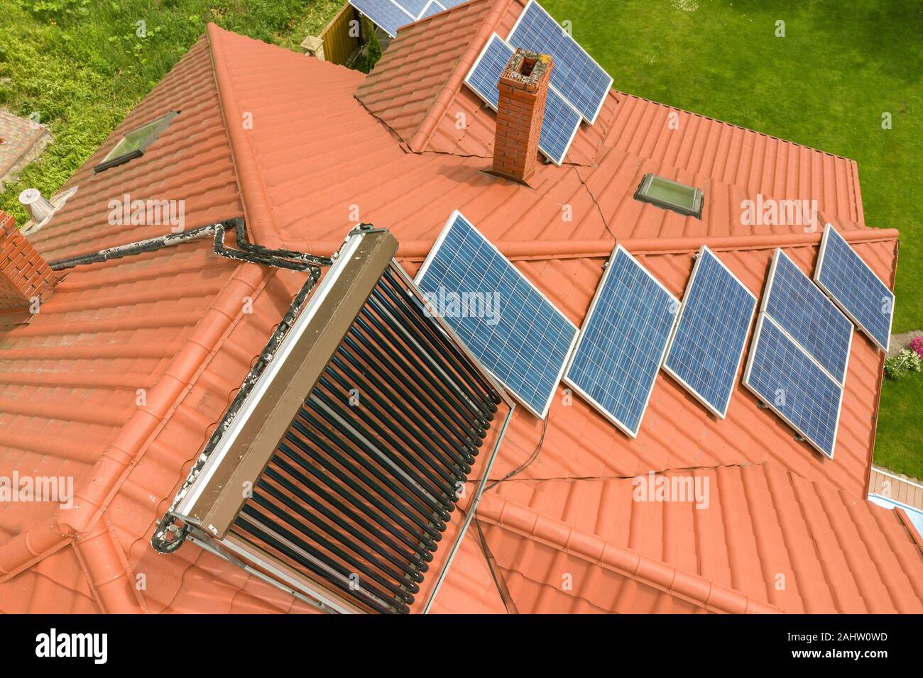 Aerial view of a new autonomous house with solar panels and water ...