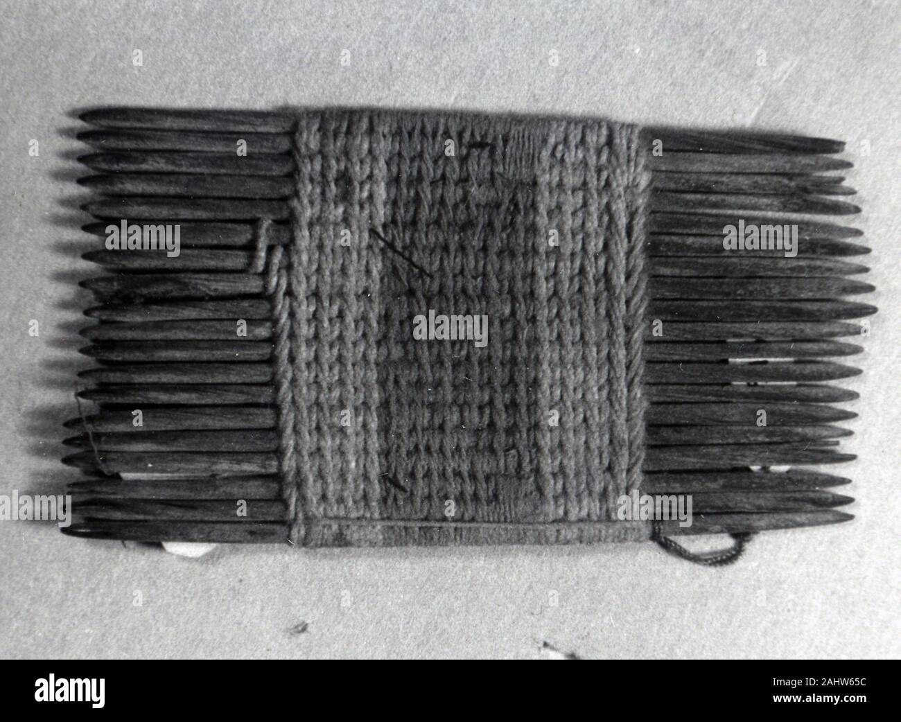 Comb. Peru. Double comb; flexible; tan and brown weaving in center ...