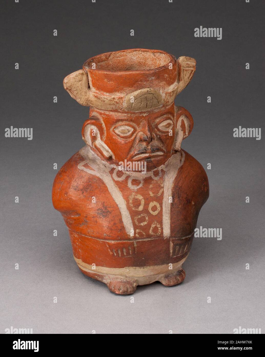 Moche. Jar in the Form of a Figure with Modeled Head and Painted Tunic ...