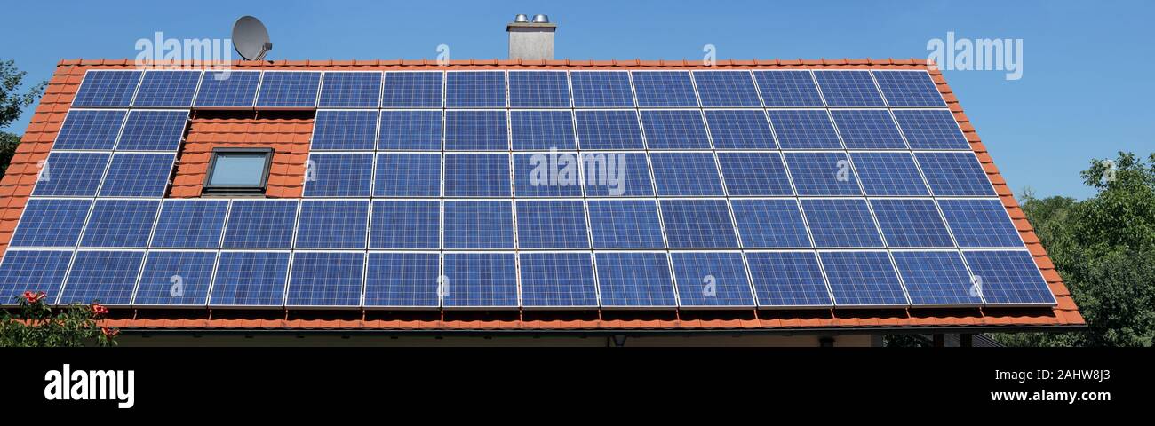 House with solar moduls Stock Photo - Alamy