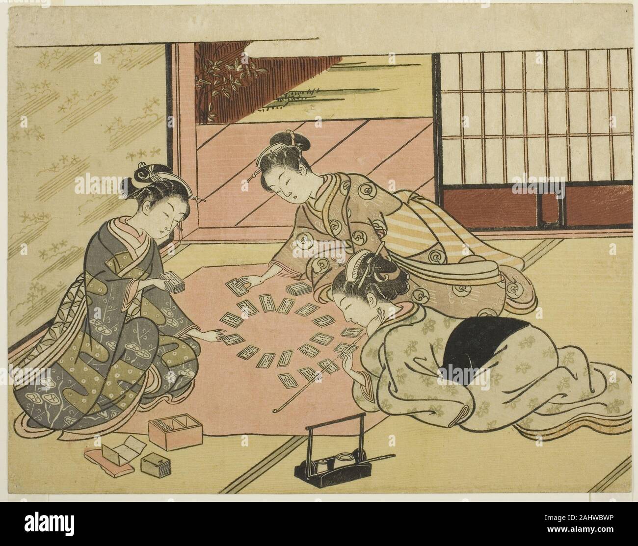 Young women playing poem cards hi-res stock photography and images - Alamy