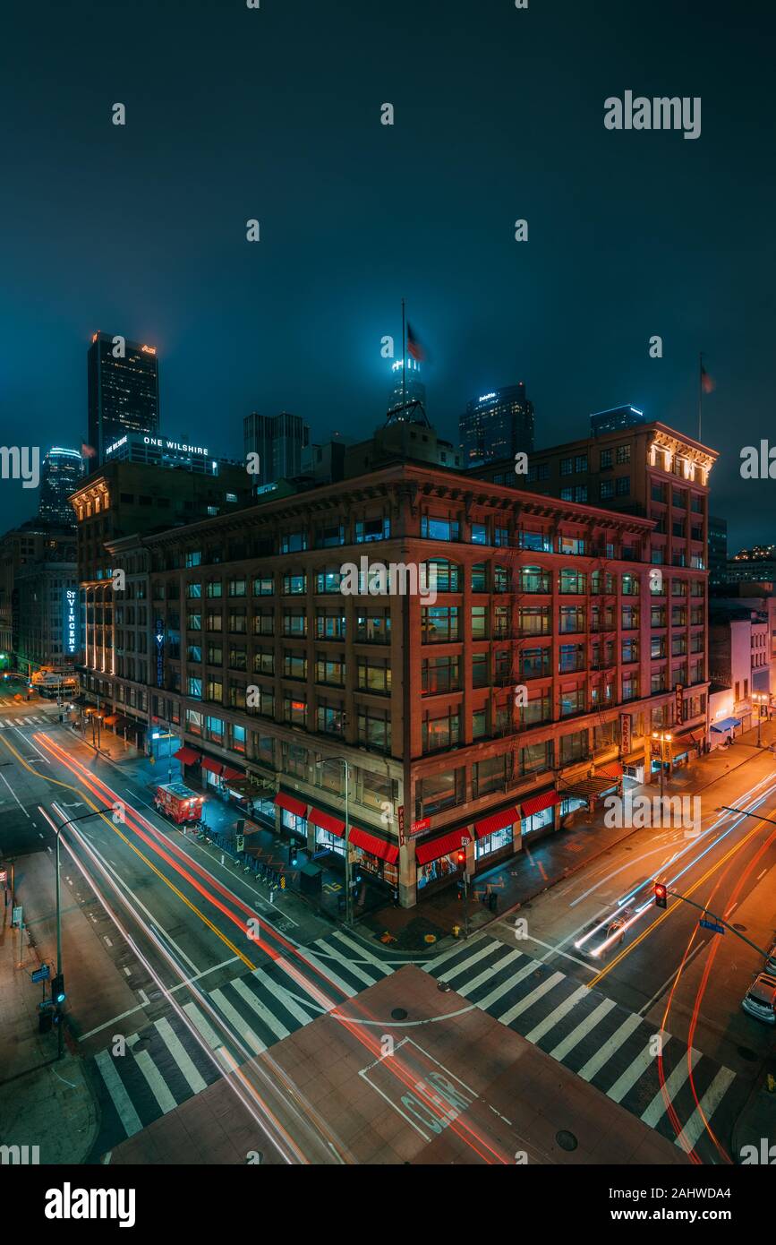 View of the intersection of Broadway and 7th Street at night in ...