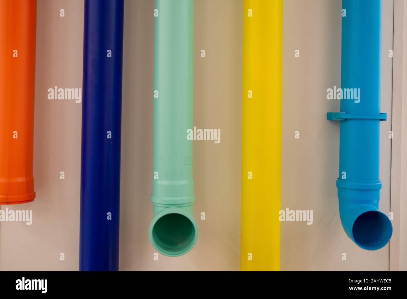 colorful pipes on the wall Stock Photo - Alamy