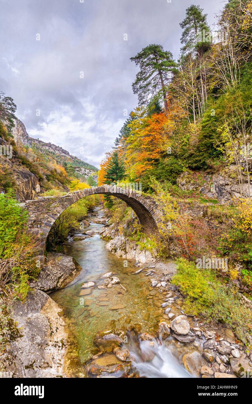 Romanesque bridge near Isaba in Belagua River, Roncal Valley, Navarra ...