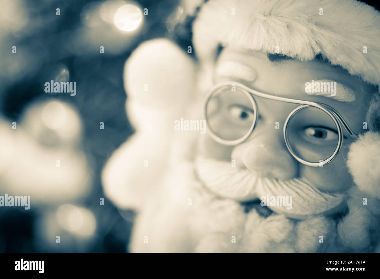 Portrait Santa Claus face in glasses, dark blue tone Stock Photo - Alamy