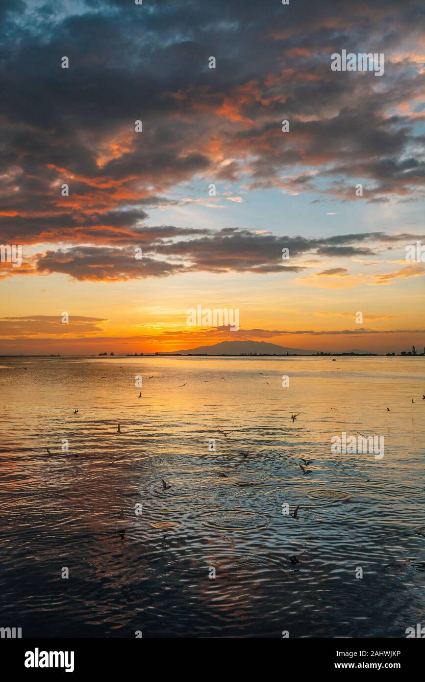 Sunset over Manila Bay in Ermita, Manila, The Philippines Stock Photo ...