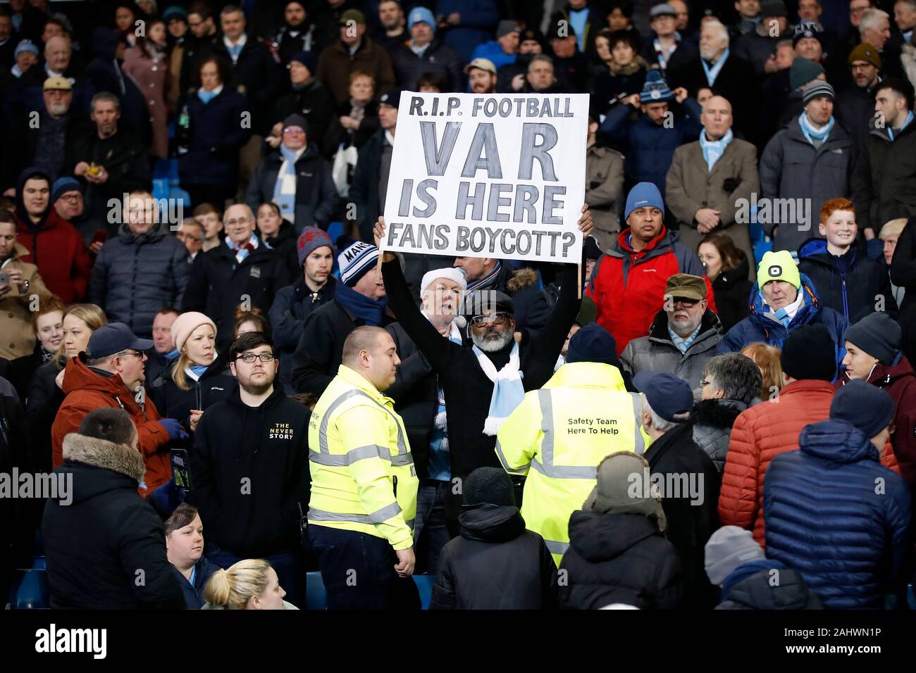 A fan holds a boycott VAR sign in the stands during the Premier League ...
