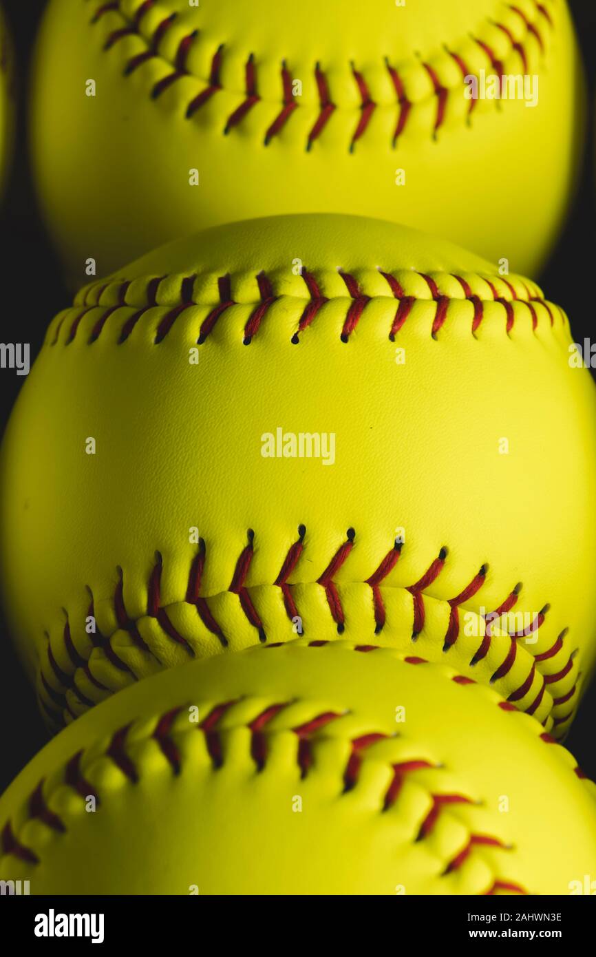 fastpitch softball balls close up with nobody Stock Photo - Alamy