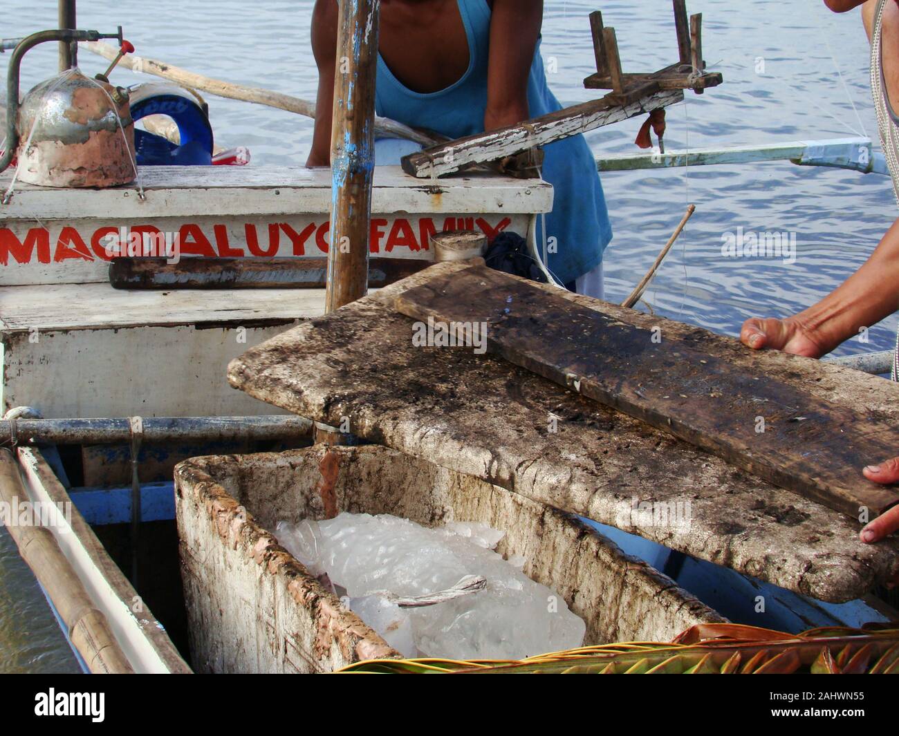 Dirty styrofoam boxes with ice blocks for keeping the fish catch ...