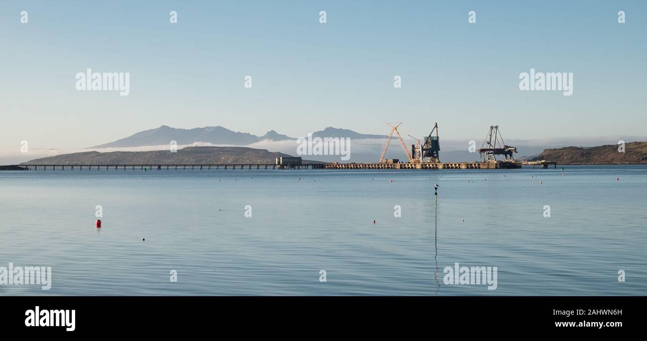 The Isle of Arran on New Years Eve with the old Hunterston Oar jetty in ...