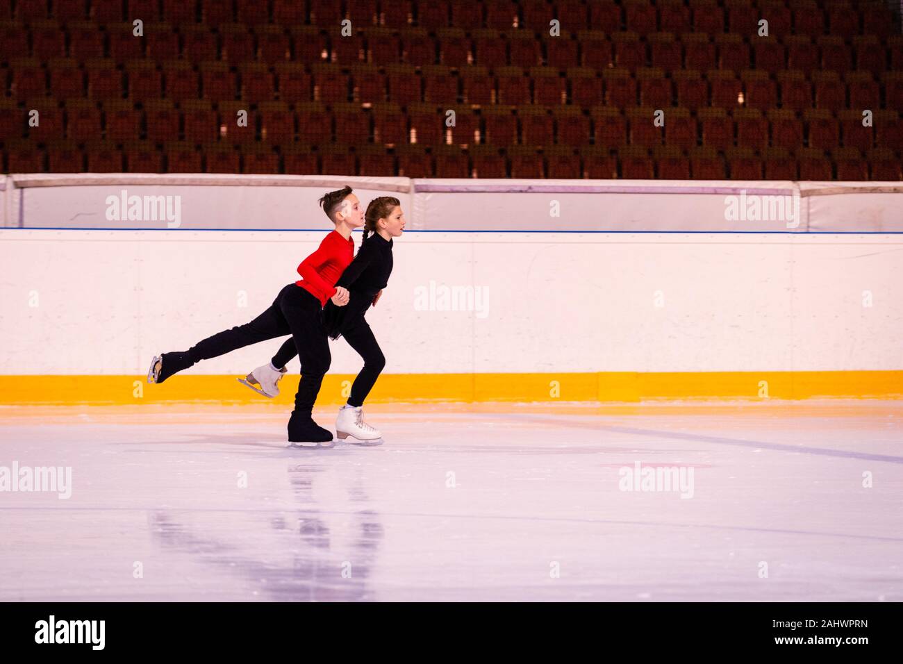 hildren-athletes learn pair figure skating. parallel pair motion ...