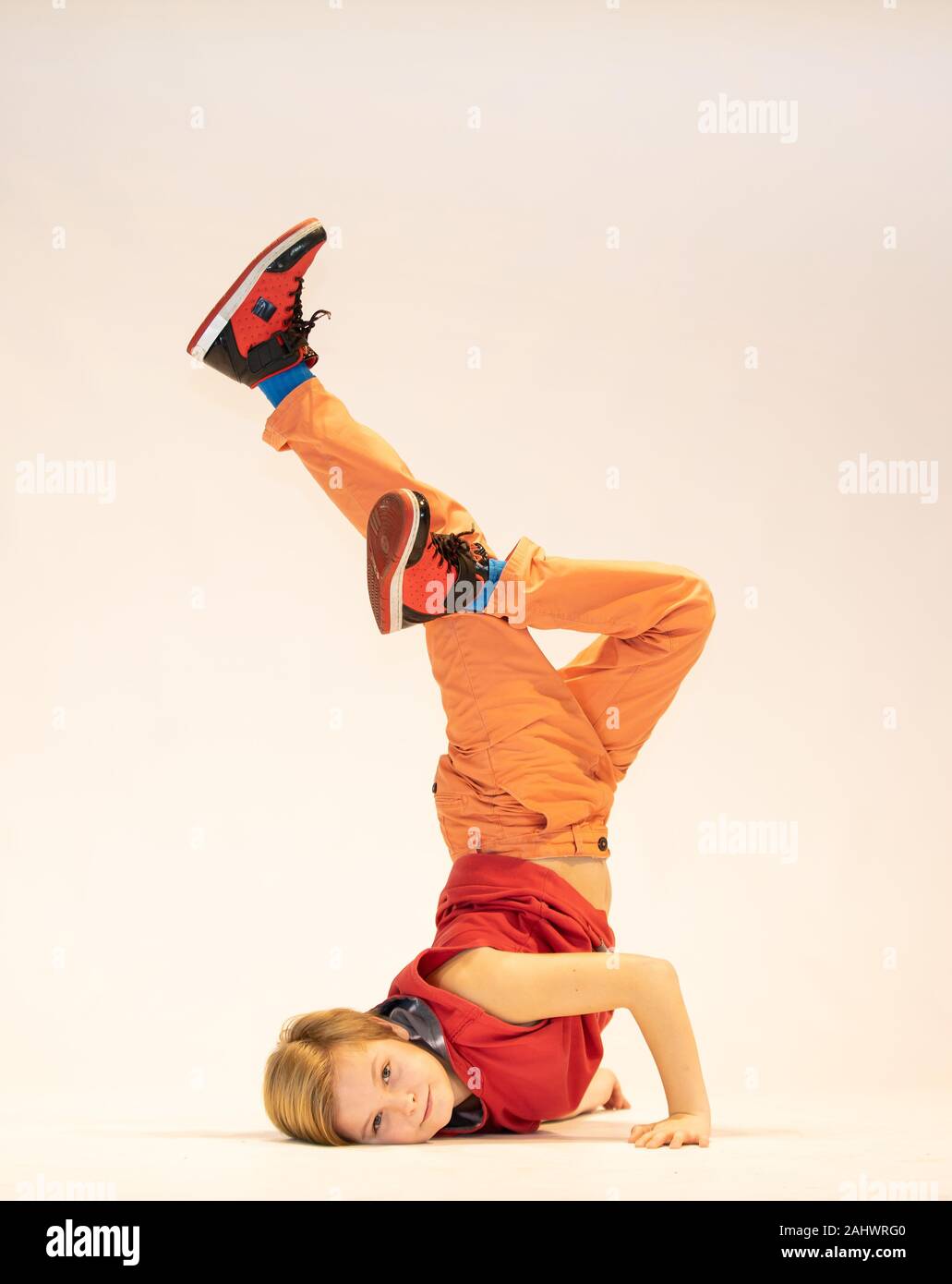 boy in a unique dance position, breakdance Stock Photo - Alamy