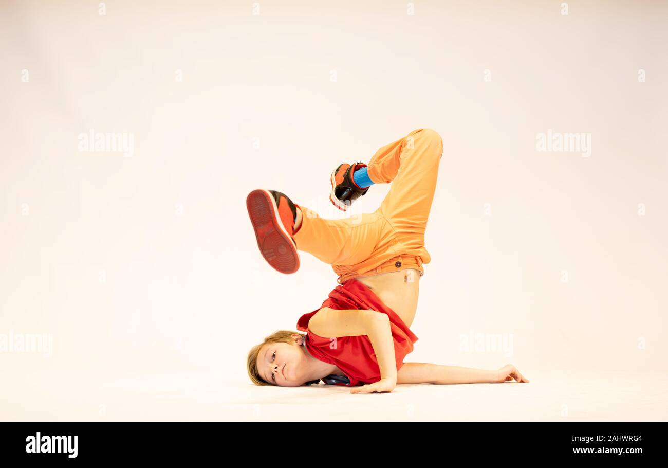 boy in a unique dance position, breakdance Stock Photo - Alamy
