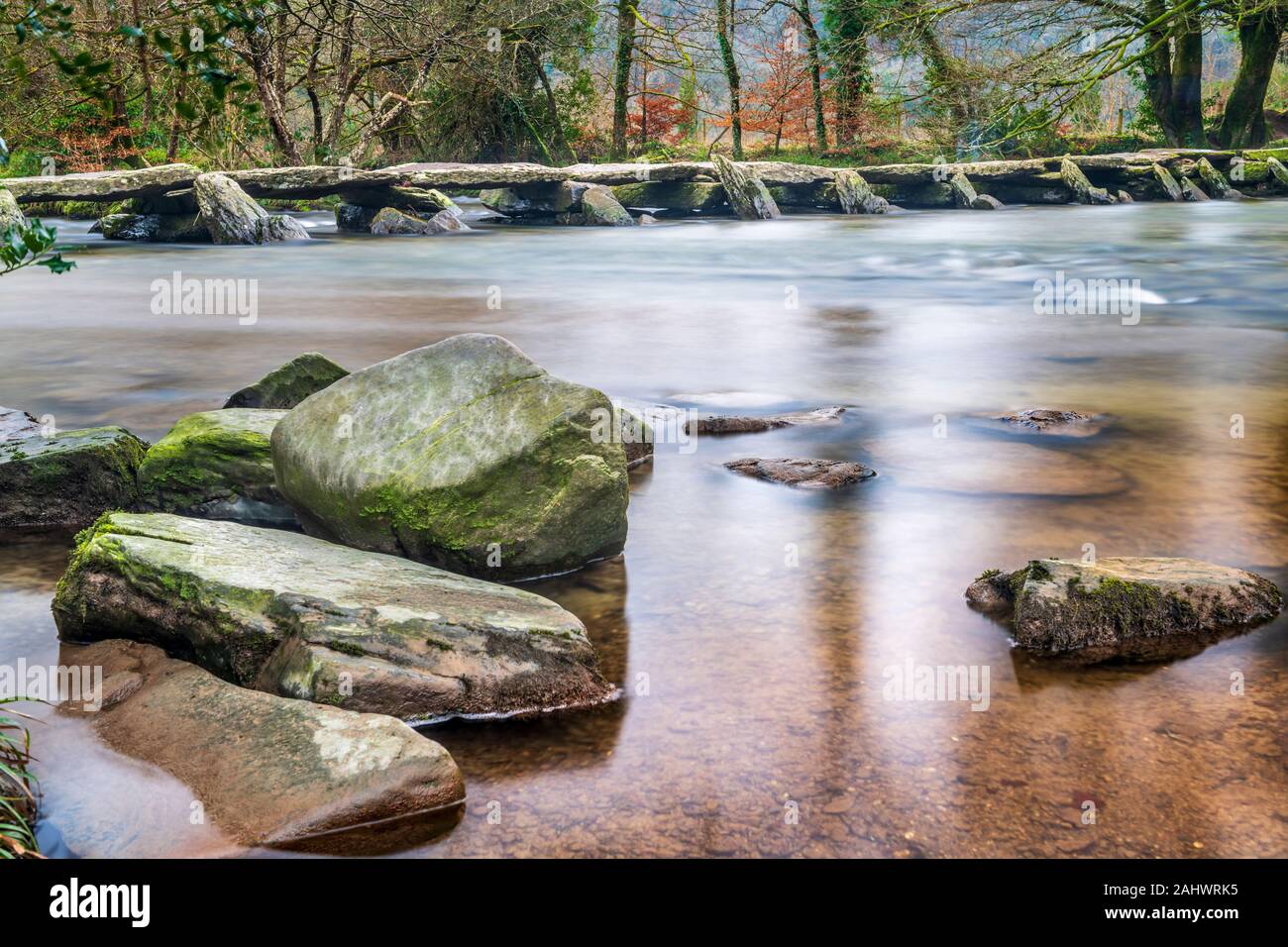The Tarr Steps is a clapper bridge which spans the River Barle in the ...