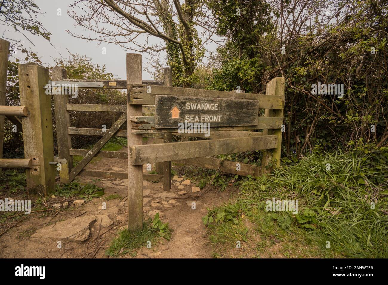 Wooden gate with a sign directing to Swanage Seafront, Swanage, Dorset ...