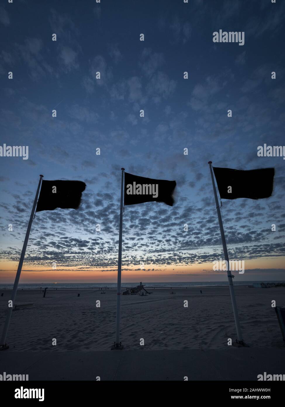 Flags out on beach hi-res stock photography and images - Alamy
