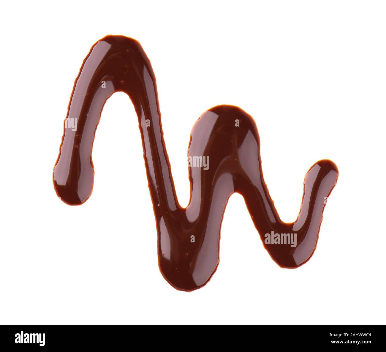 Chocolate syrup drizzle isolated on white background. Splashes of sweet ...