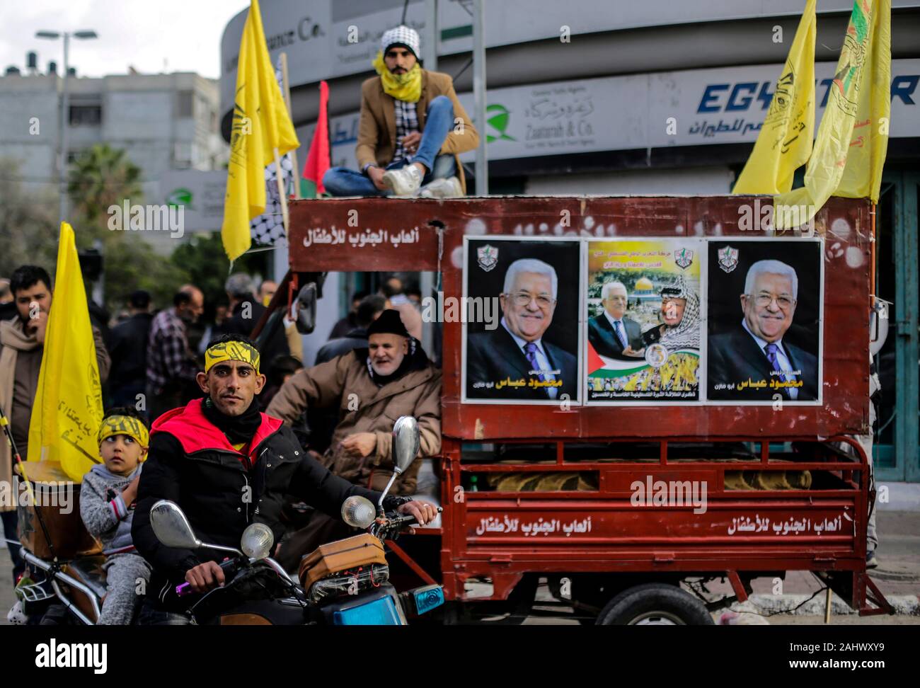 Palestinian Fatah supporters take part in a rally marking the 55th ...