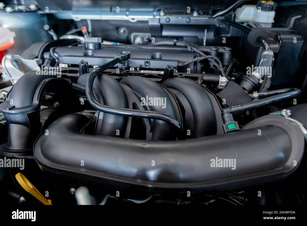 New car engine. Car hood open. Automotive industry Stock Photo - Alamy