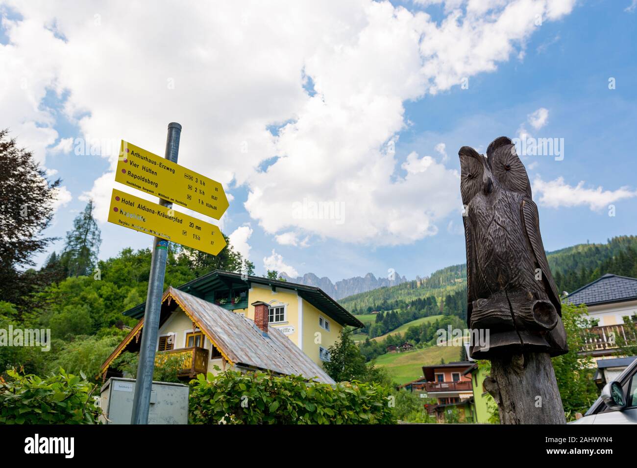 Yellow hiking table showing the way for hiking Austria alps Stock Photo ...