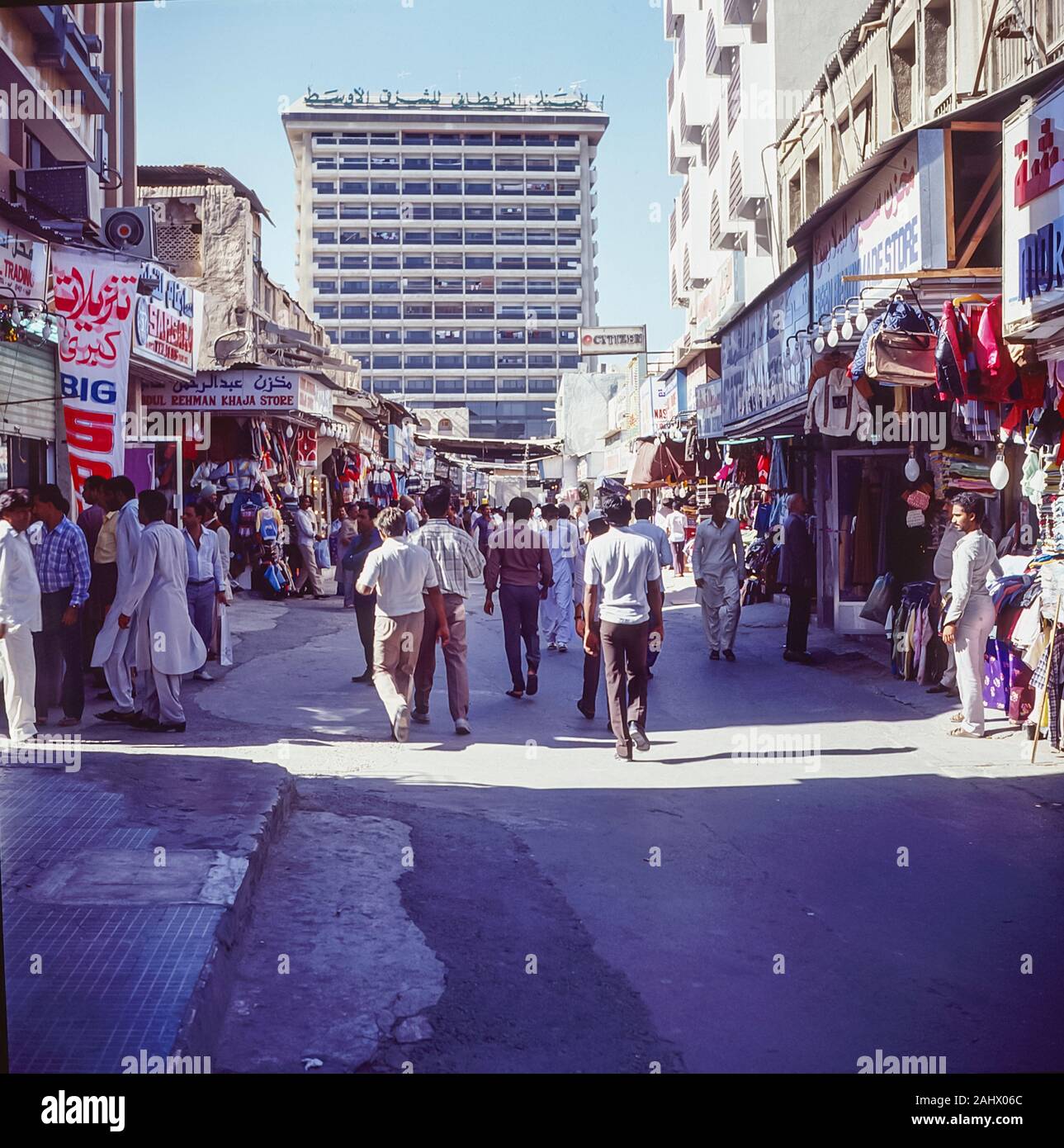 Dubai street scene in the old suq market place area looking along Al ...