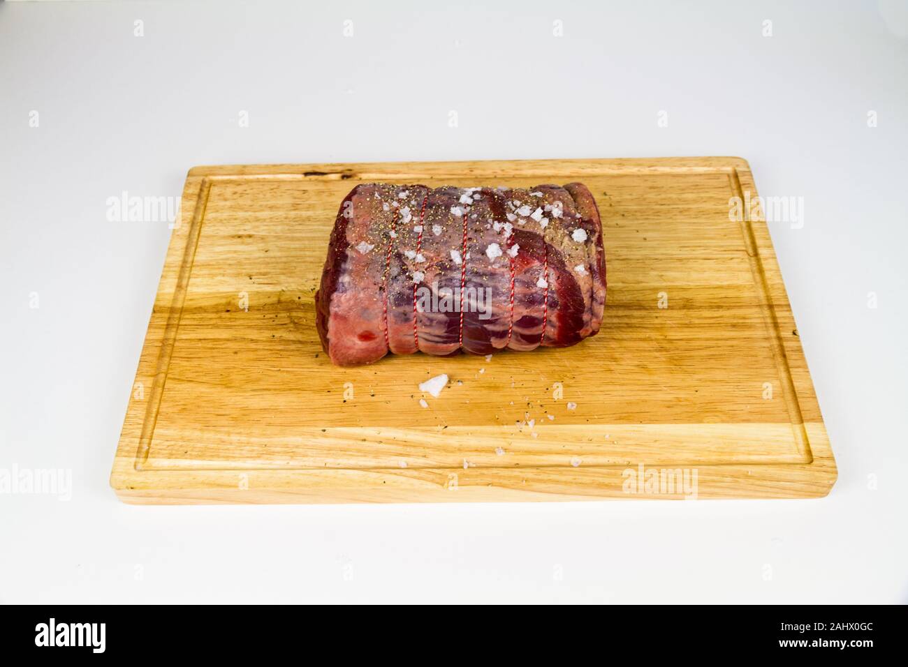 Rolled seasoned meat hi-res stock photography and images - Alamy