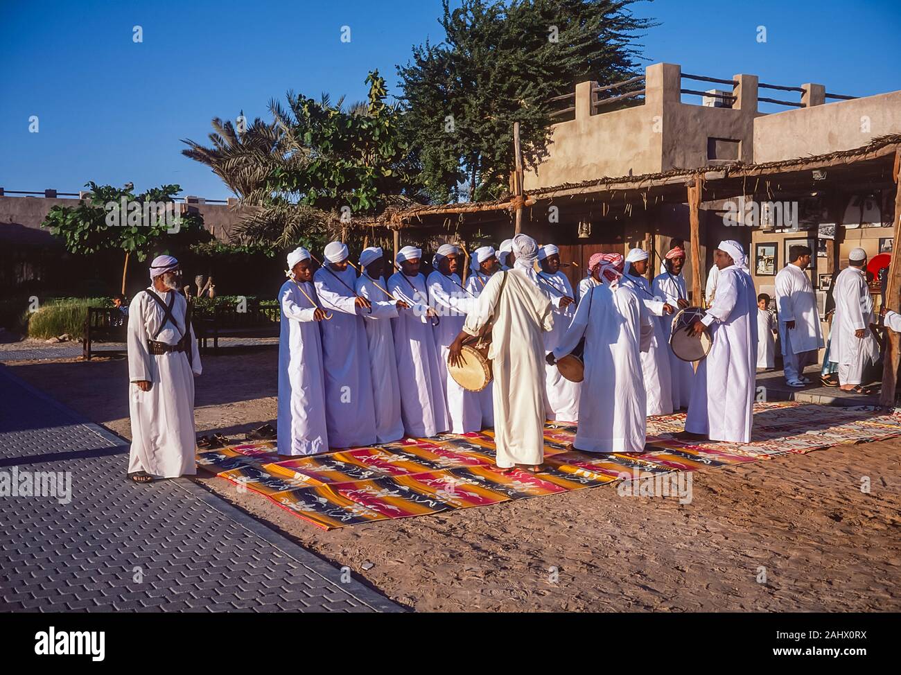 Dubai Arab folklore and history with a group of performing Emirati men ...