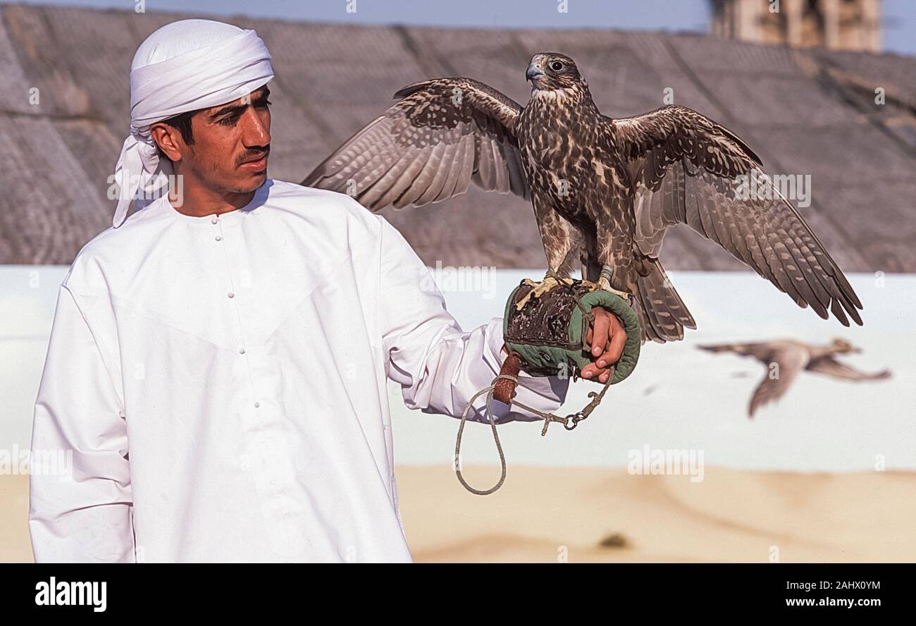 Dubai Arab folklore and history with a young Emirati man demonstrating ...