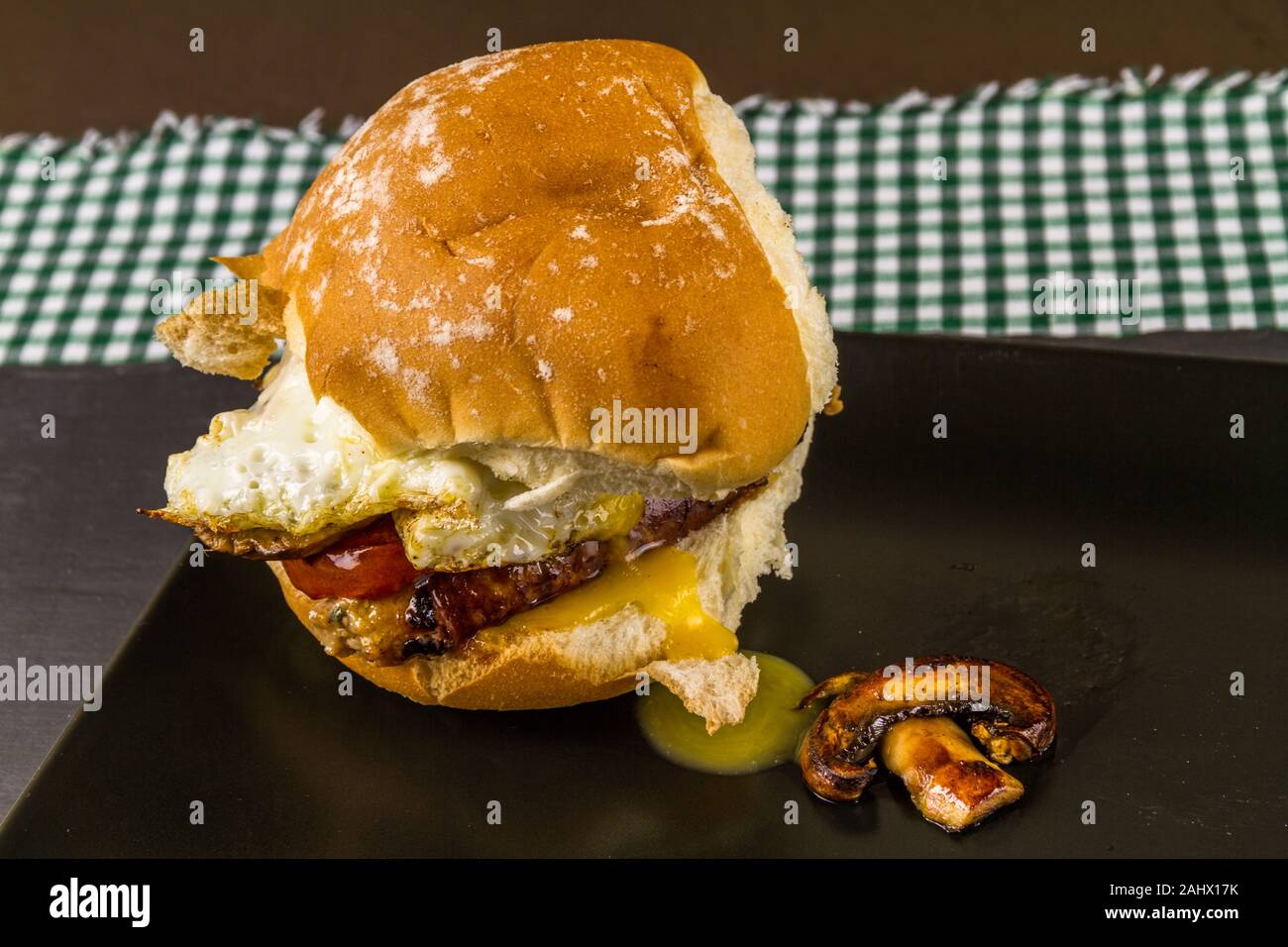 Elevated view of an English breakfast roll made from white bread with ...