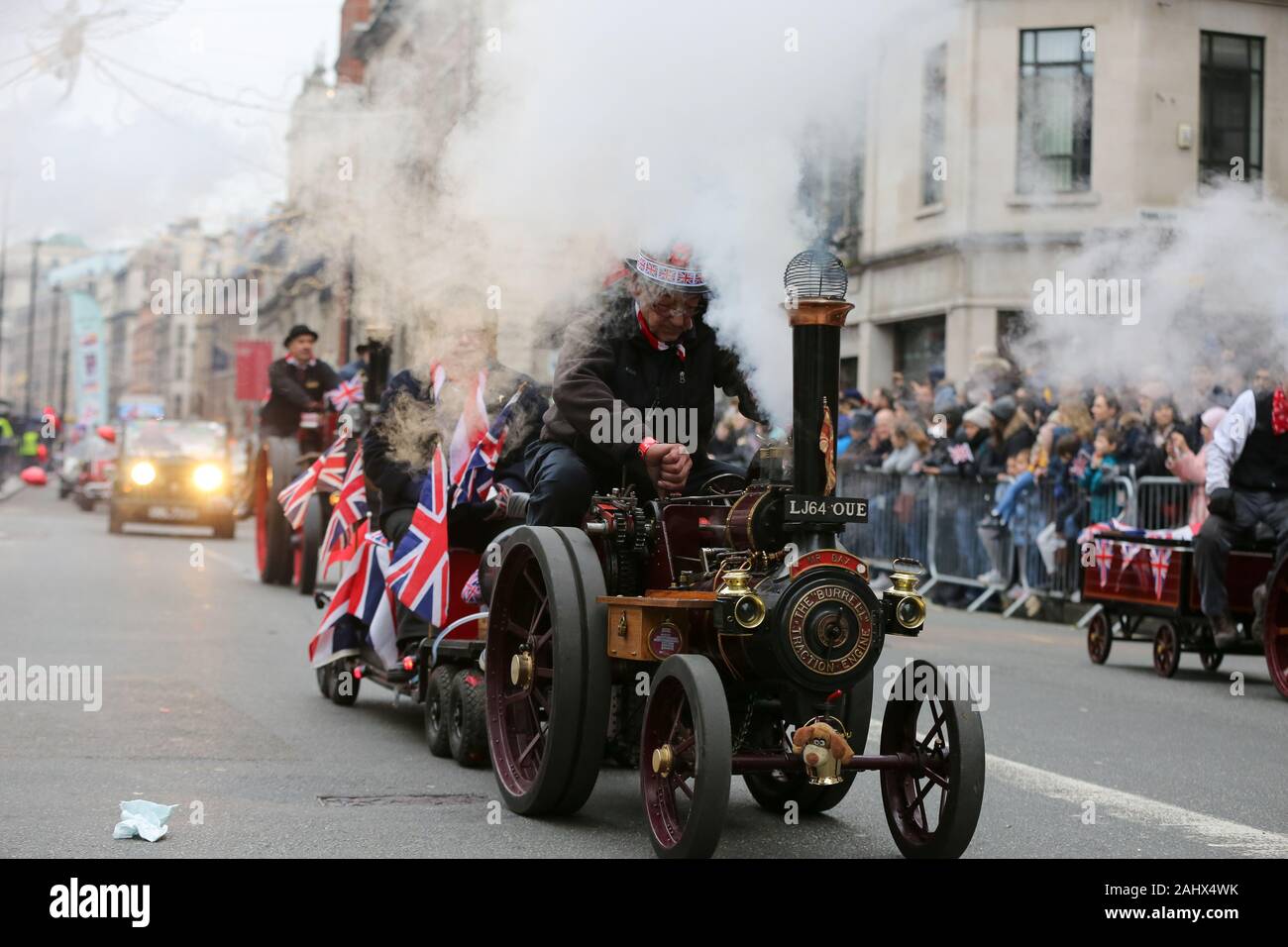 Miniature steam engines are driven during the annual London New Year's ...