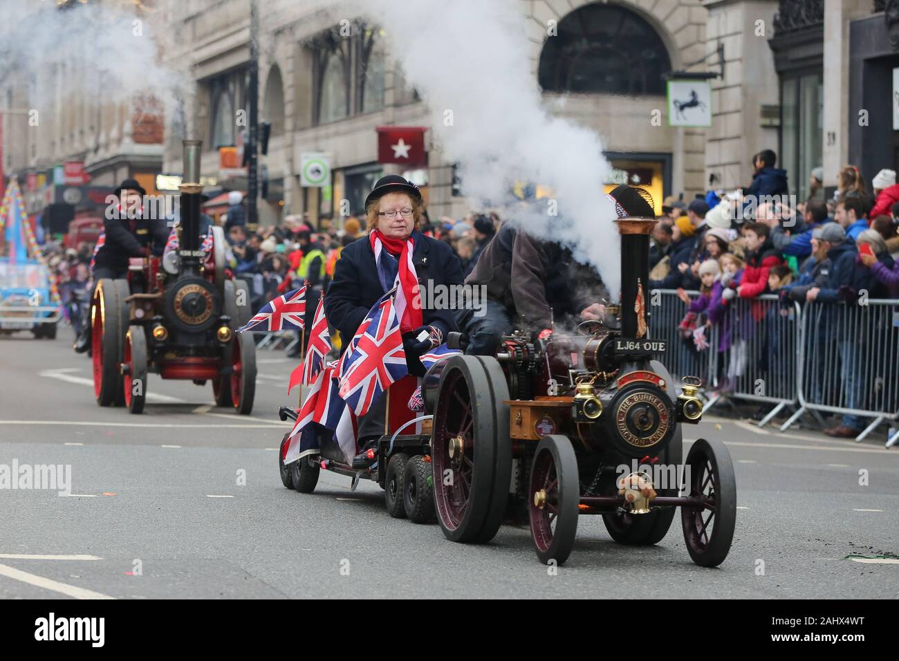 Miniature steam engines are driven during the annual London New Year's ...