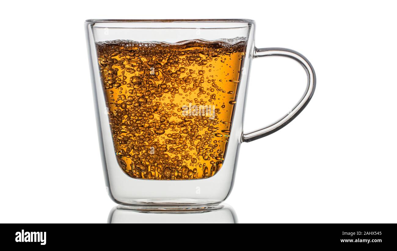 Glass transparent thermos cup with tea on a white background Stock ...